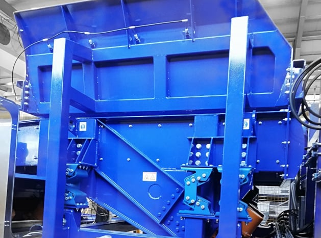 Elevadores y volteadores con sistema de carga automatizada